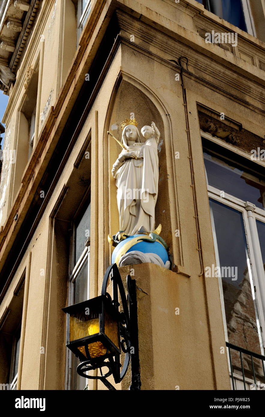 Typical Marie statues on the corners in the centr of Antwerp (Belgium ...