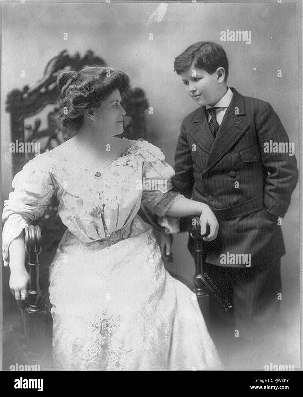 Belle Case LaFollette, three-quarter length portrait, seated, with son ...