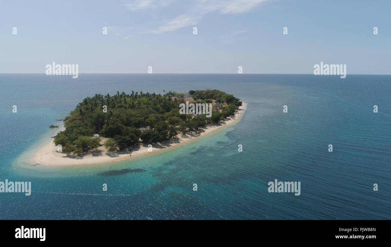 Tropical island with white sandy beach. Aerial view: Putipot island ...