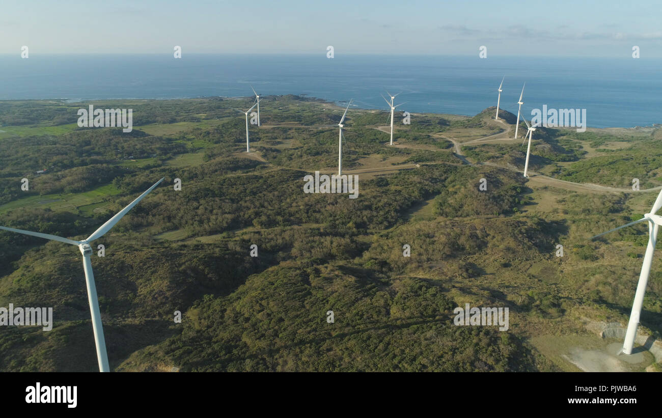 Aerial view of Windmills for electric power production on the seashore ...