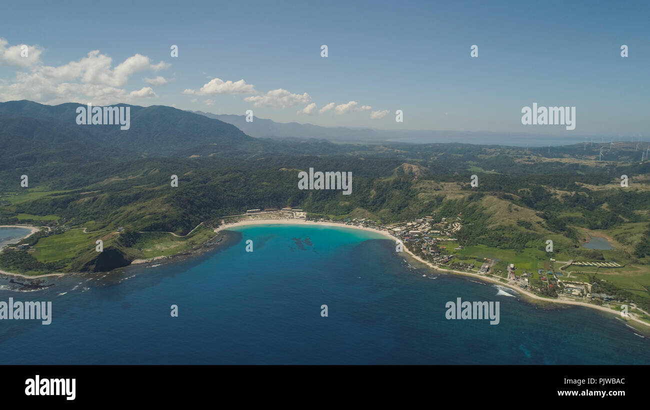Aerial view of beautiful tropical beach with turquoise water in blue ...