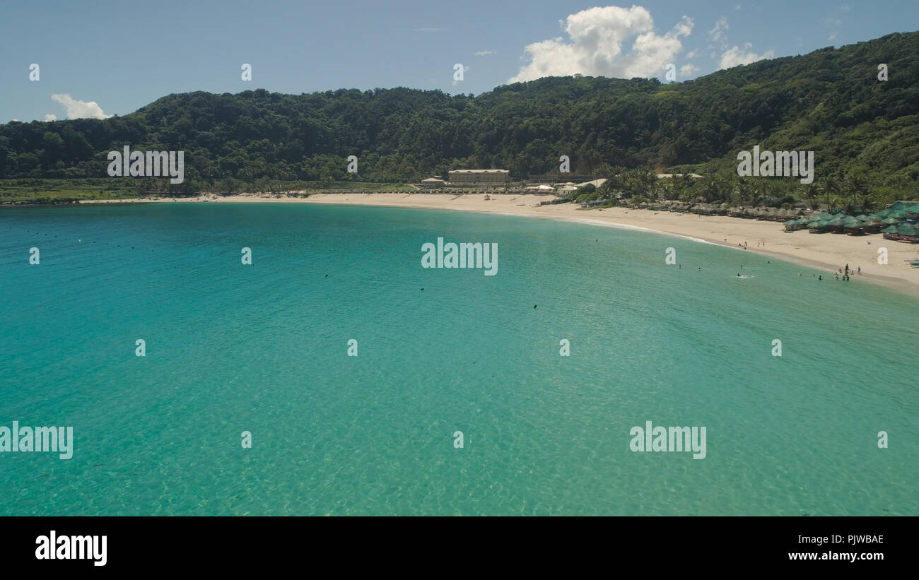 Aerial view of beautiful tropical beach with turquoise water in blue ...