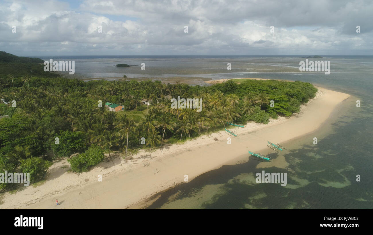 Aerial view of beautiful tropical beach with turquoise water in blue ...