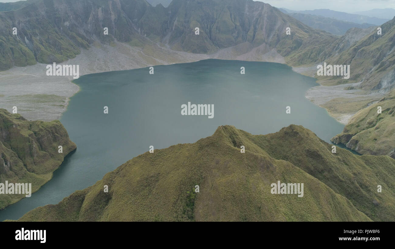 Crater lake of the volcano Pinatubo among the mountains, Philippines ...