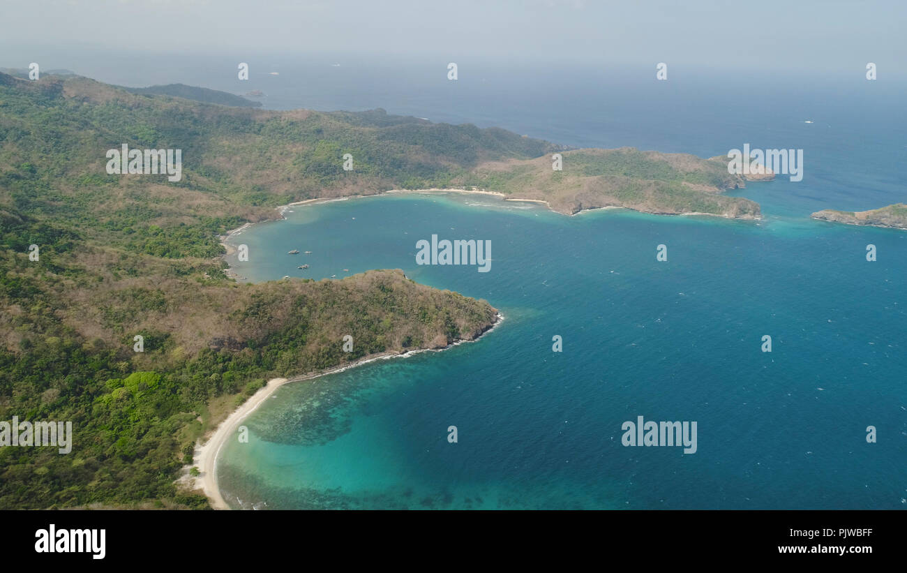 Aerial view of seashore with beach, lagoons and coral reefs ...