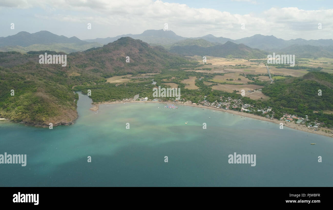 Aerial view of seashore with beach, lagoons and coral reefs ...