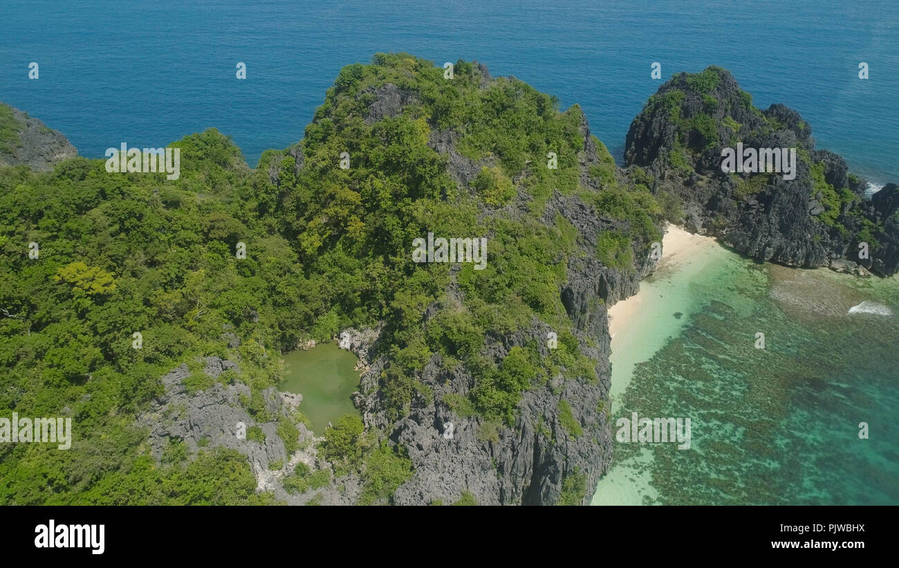 Aerial view Matukad island with sand beach and turquoise water in blue ...