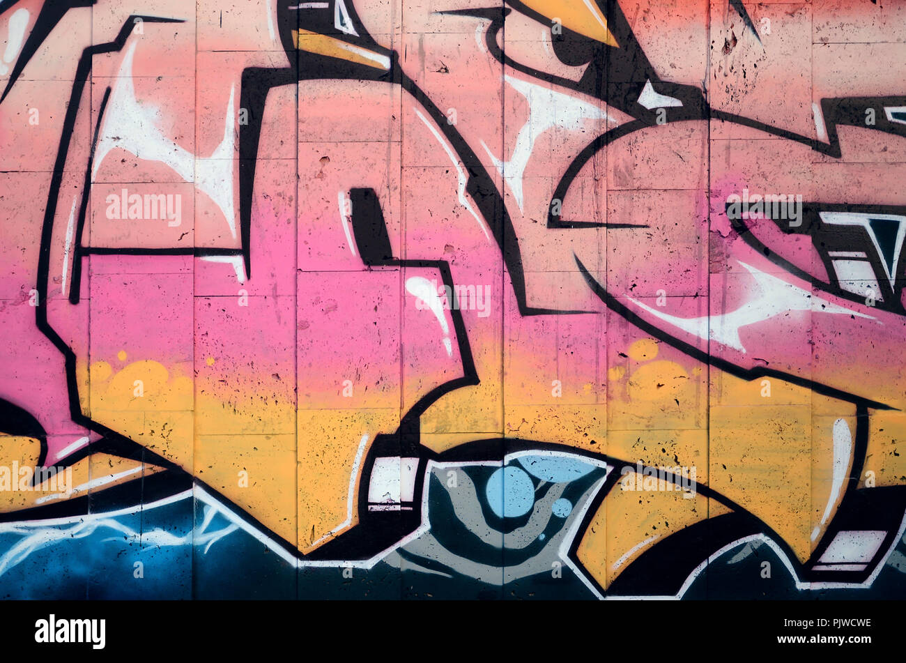 A fragment of detailed graffiti of a drawing made with aerosol paints ...