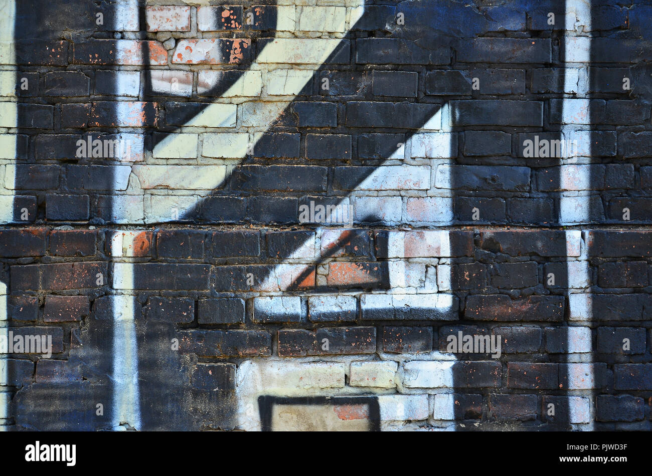 Texture of a fragment of the wall with graffiti painting, which is ...
