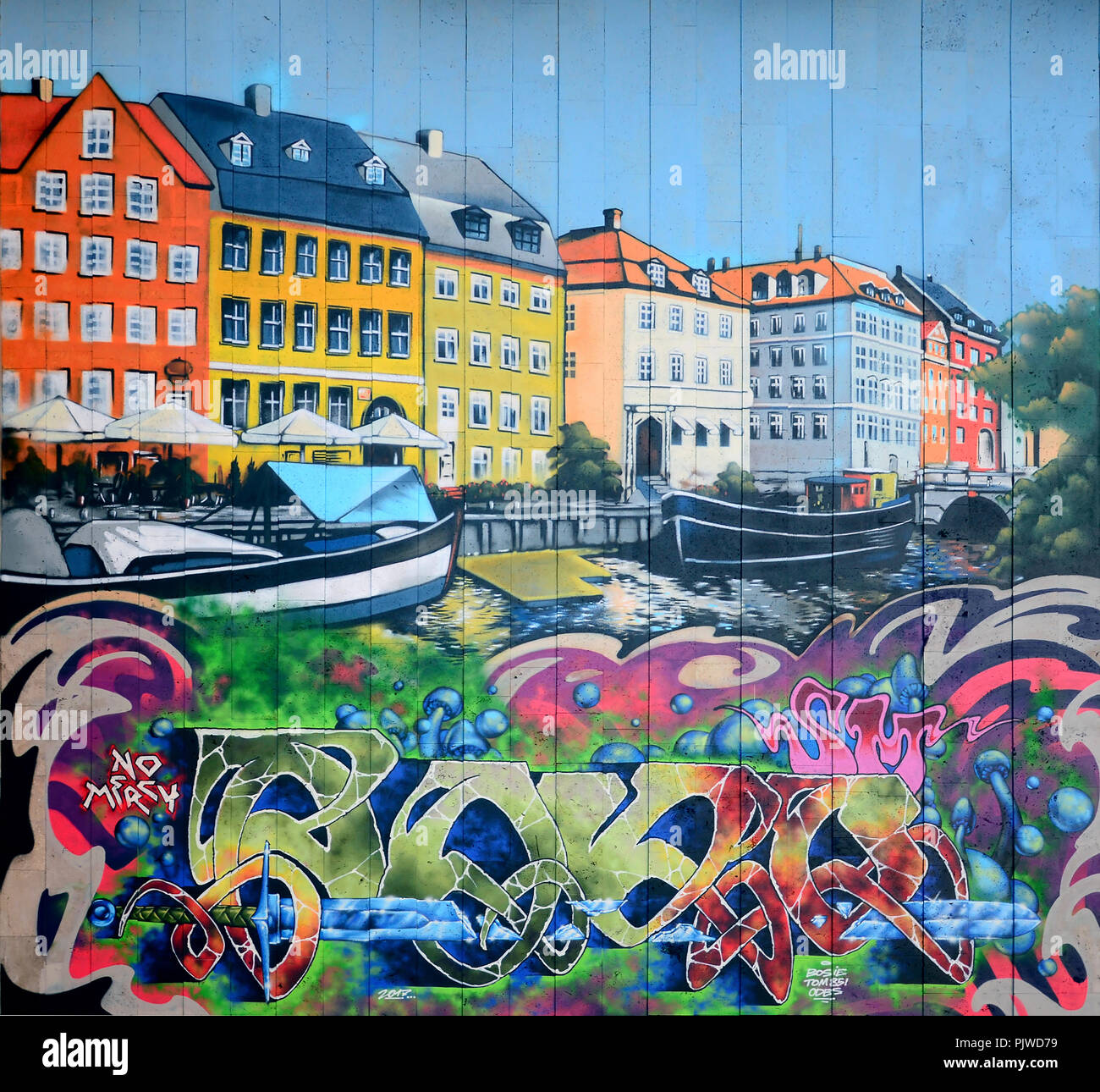 A fragment of detailed graffiti of a drawing made with aerosol paints ...