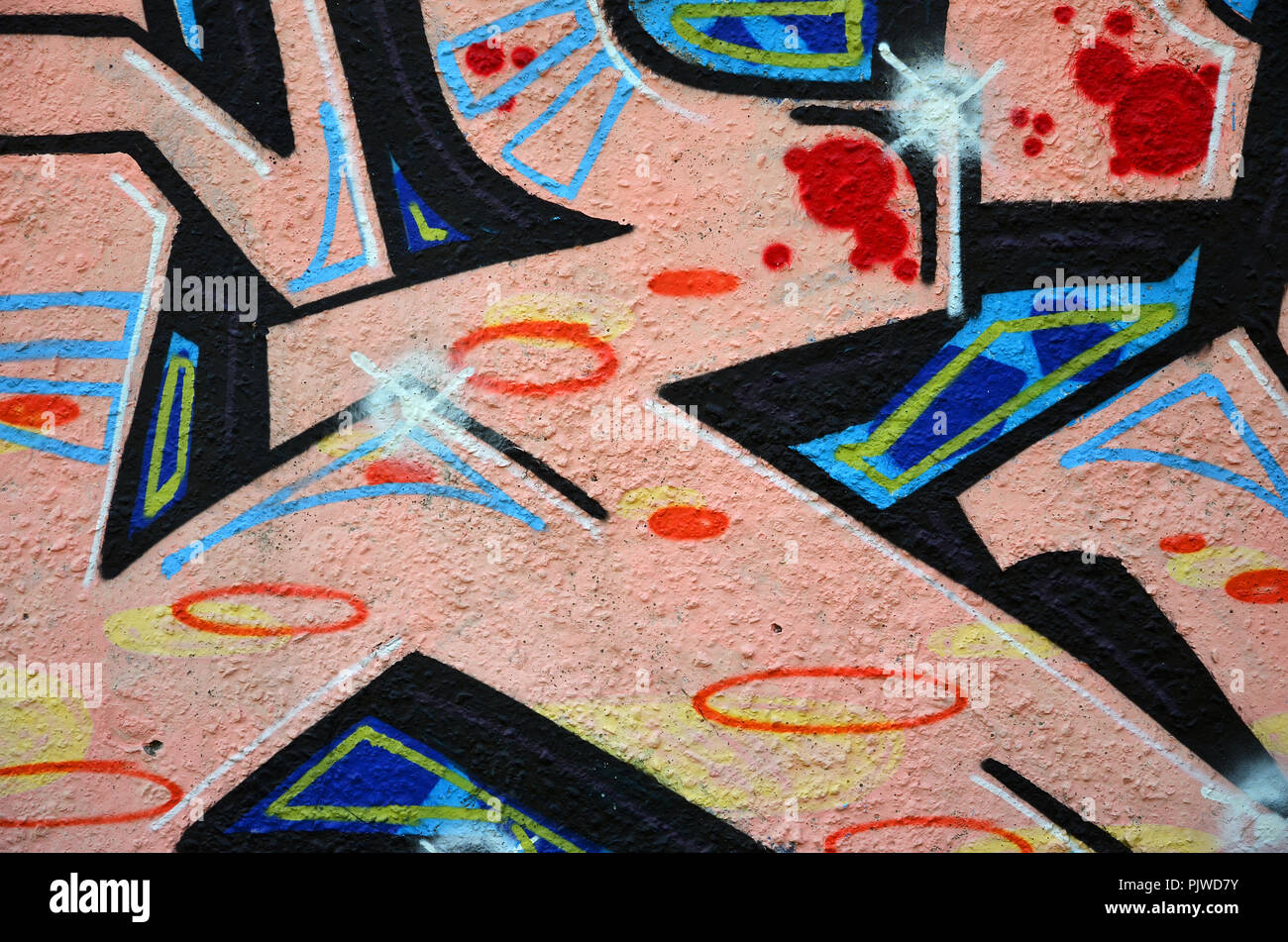 Background image of the wall decorated with colorful abstract graffiti ...