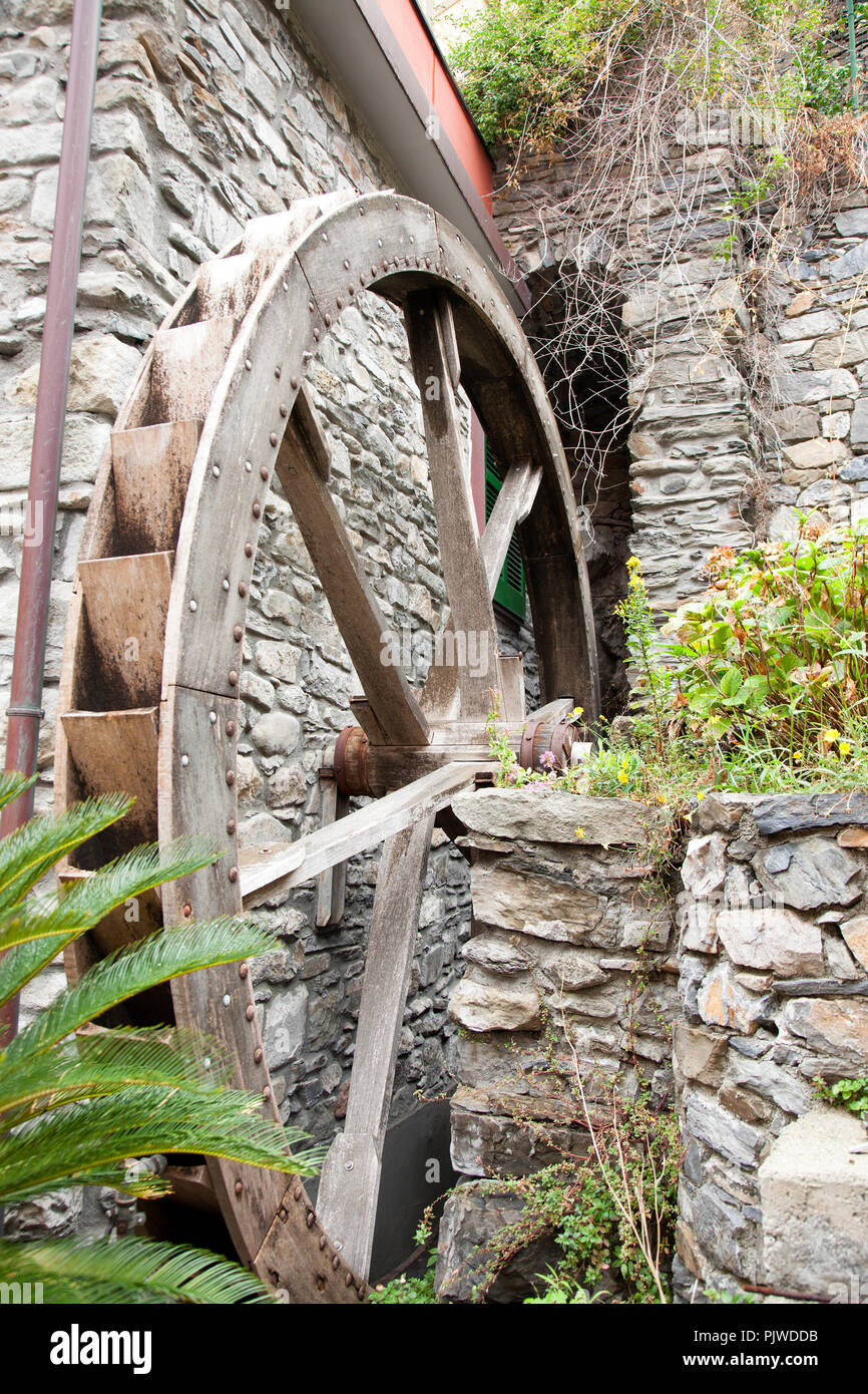 an old waterwheel still preserved in Manarola. Italy Stock Photo - Alamy