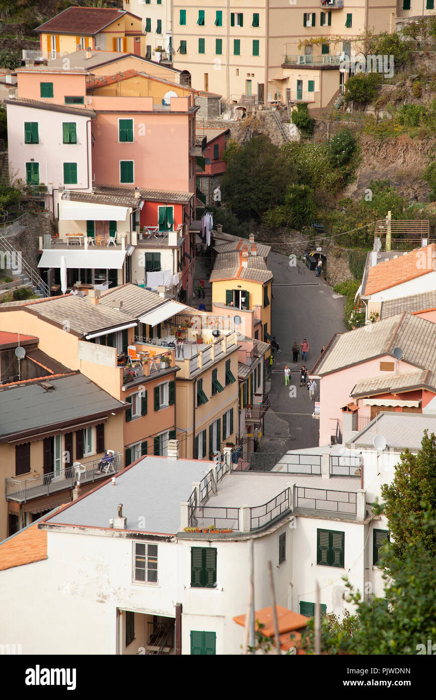the main street in the townof Manarola, Italy as it winds its way ...