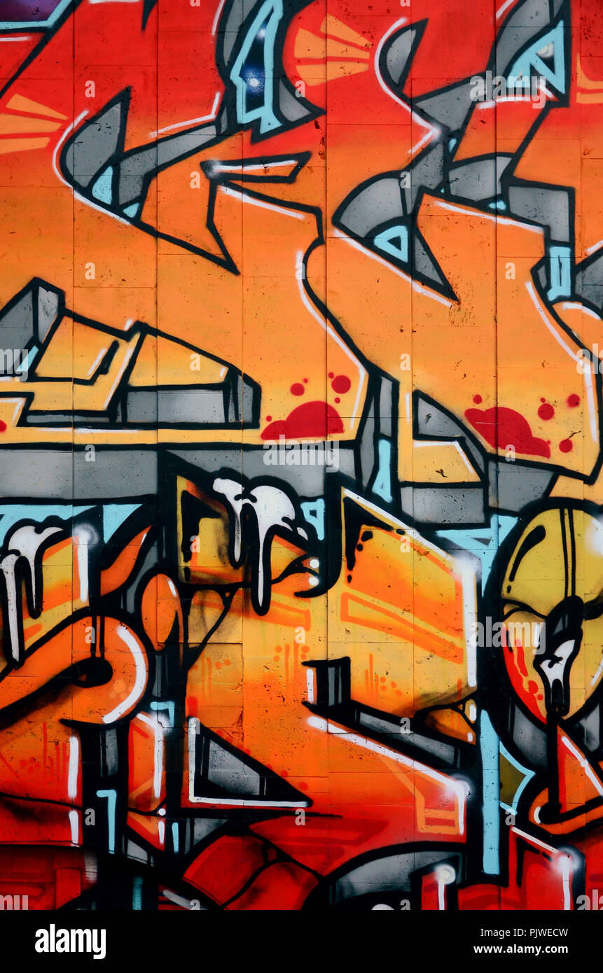 A fragment of detailed graffiti of a drawing made with aerosol paints ...