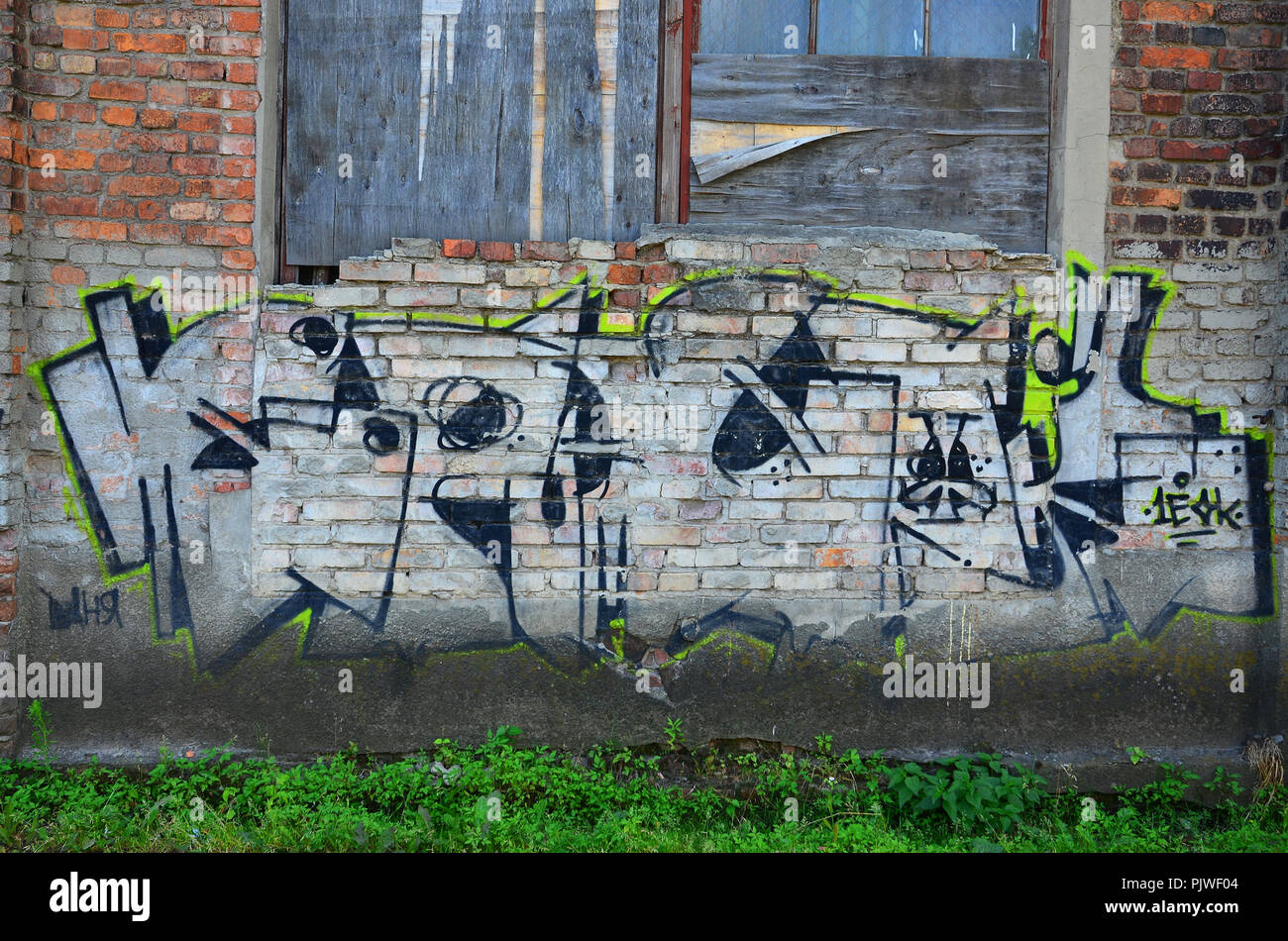 The texture of the wall with graffiti, which is depicted on it. The ...