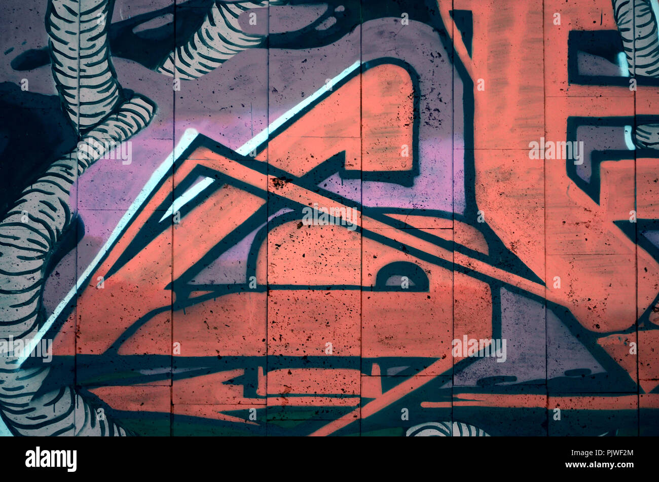 A fragment of detailed graffiti of a drawing made with aerosol paints ...