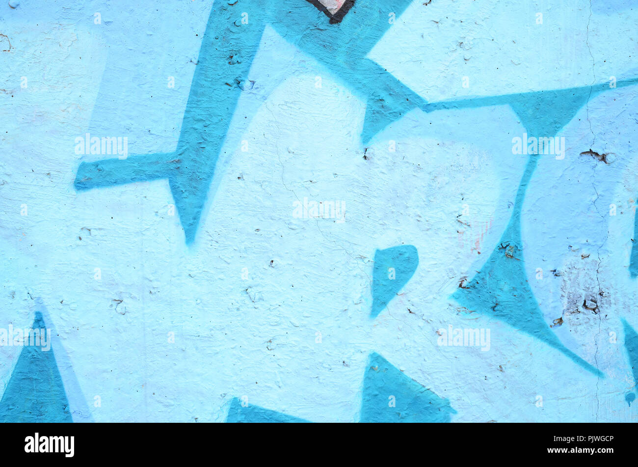 Texture of a fragment of the wall with graffiti painting, which is ...