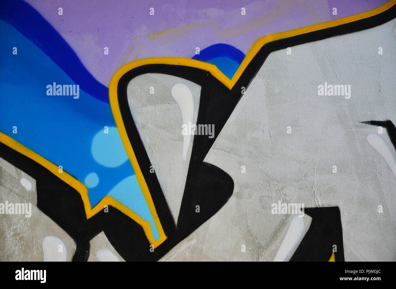 The old wall, painted in color graffiti drawing silver chrome aerosol ...