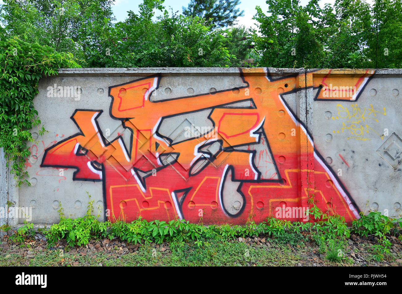 The texture of the wall with graffiti, which is depicted on it. The ...