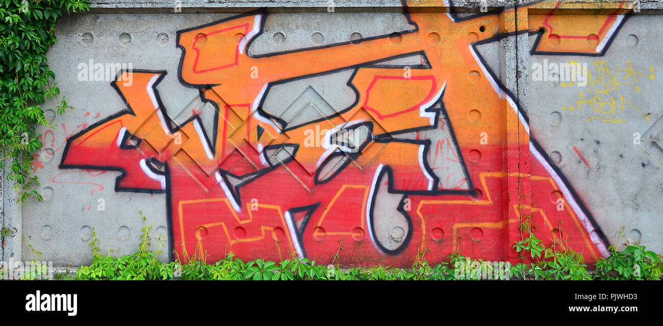 The texture of the wall with graffiti, which is depicted on it. The ...