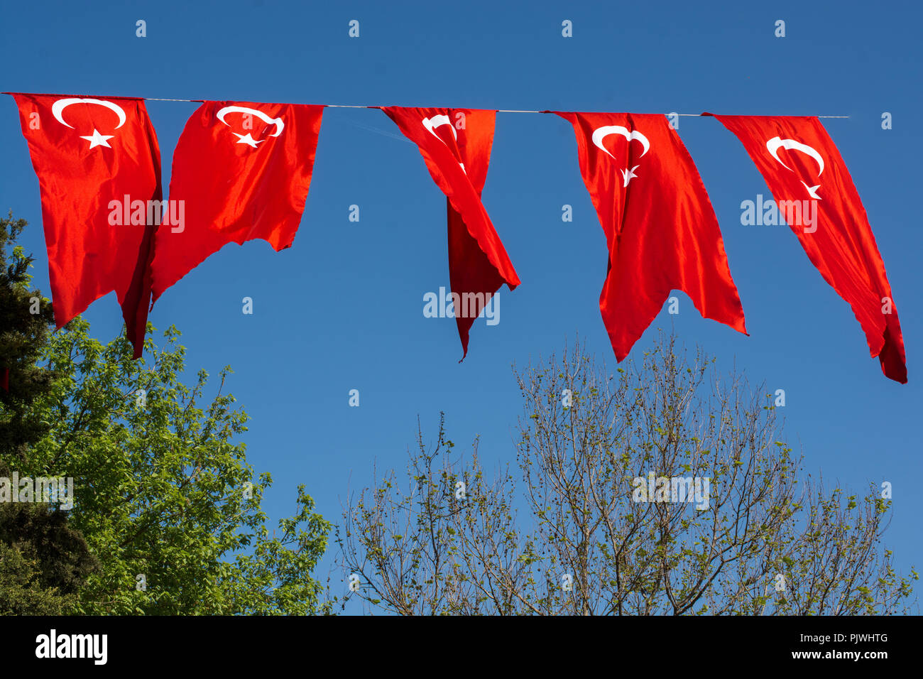 Turkish national flag hang in view in open air Stock Photo - Alamy