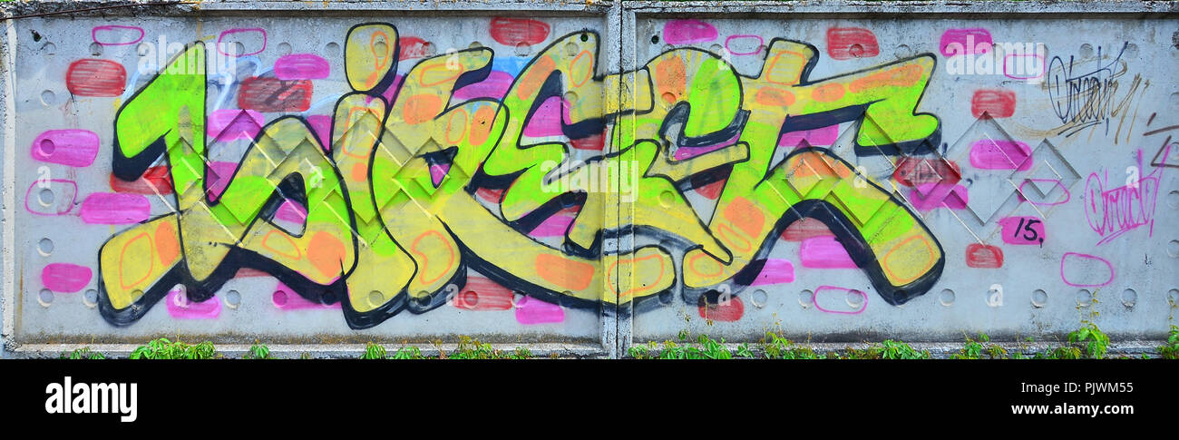 The texture of the wall with graffiti, which is depicted on it. The ...
