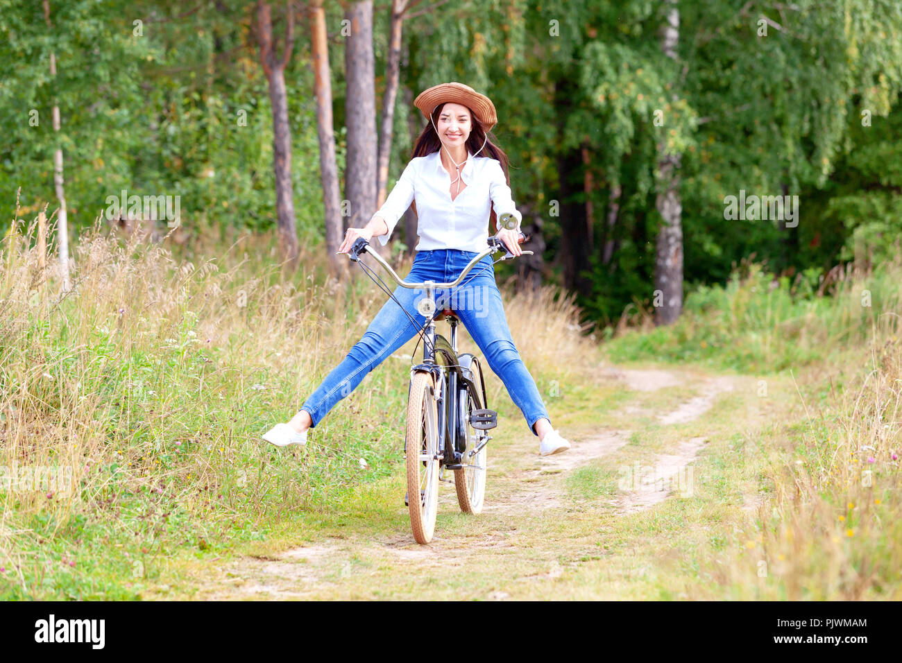 Legs beautiful woman on bicycle hi-res stock photography and images - Alamy