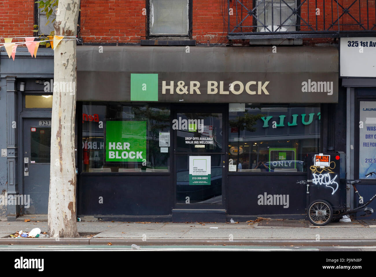 An H&R Block storefront in New York, NY Stock Photo - Alamy
