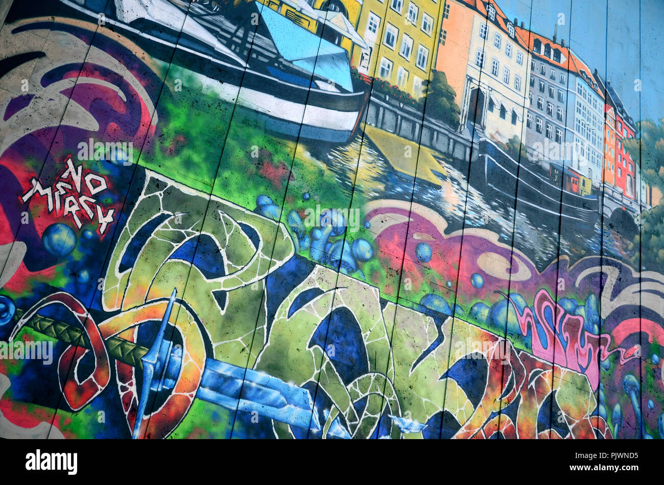 A fragment of detailed graffiti of a drawing made with aerosol paints ...