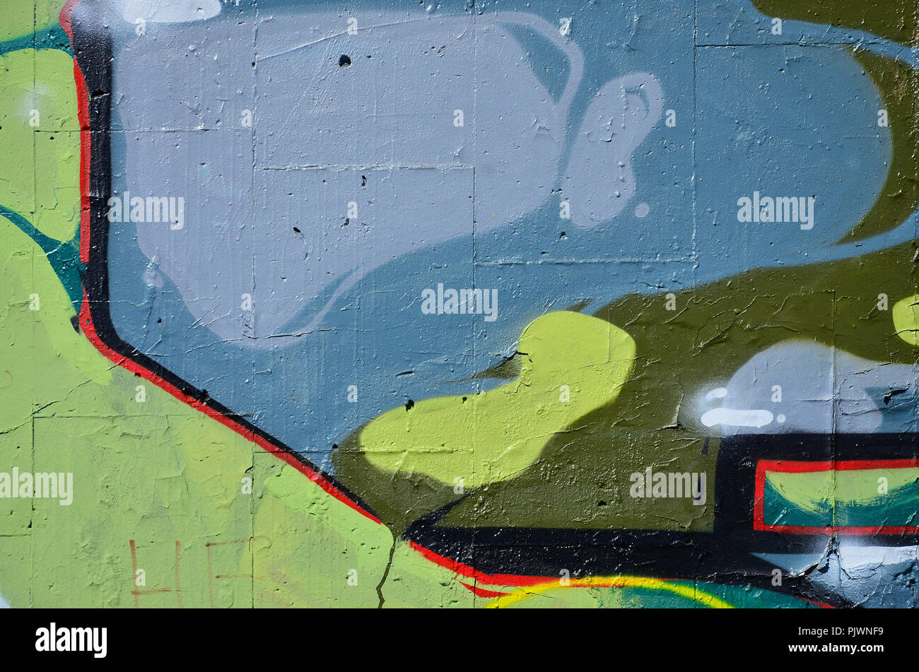 Fragment of an old colored graffiti drawing on the wall. Background ...