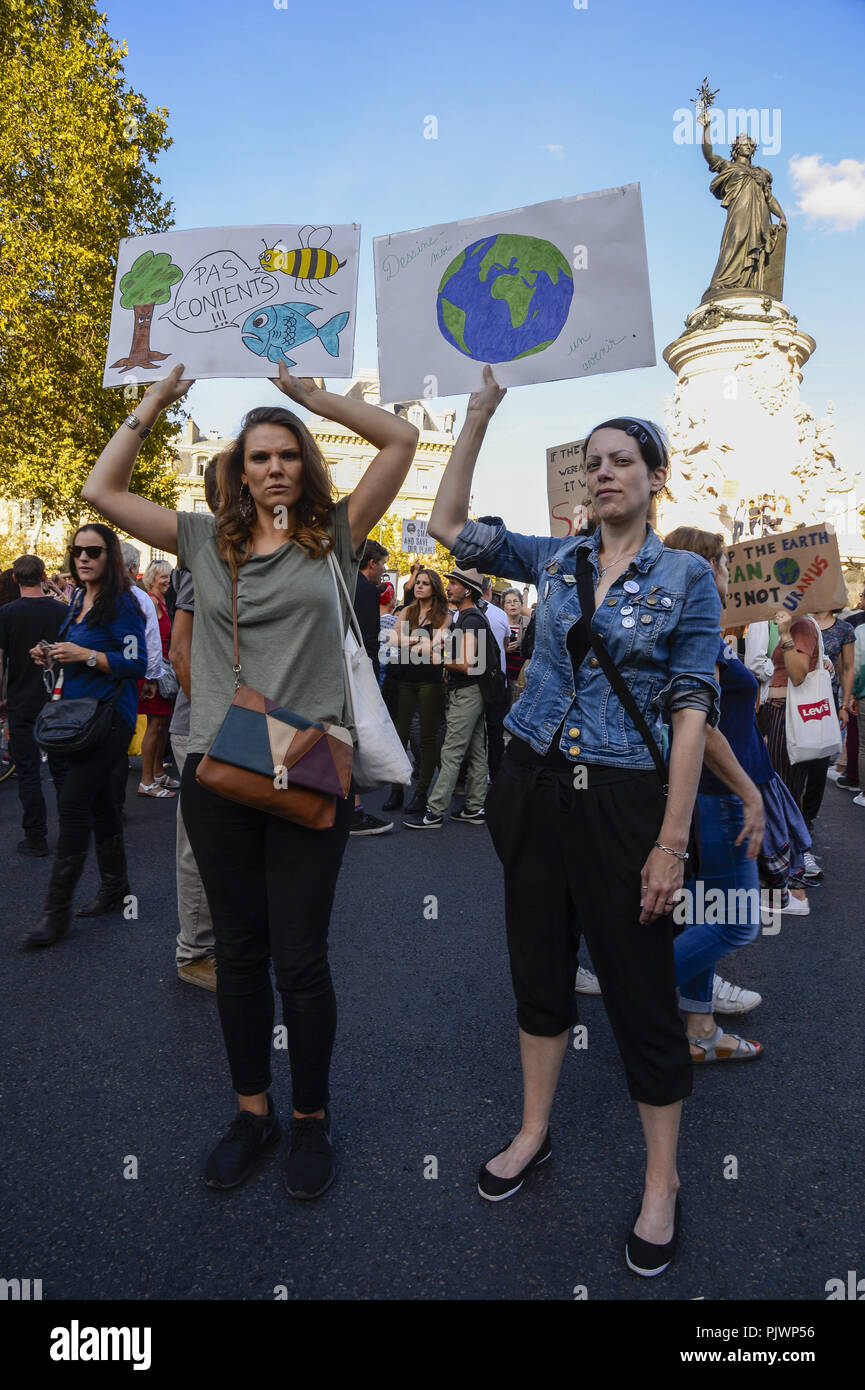 Paris, Ile de France, France. 8th Sep, 2018. Women seen holding posters ...