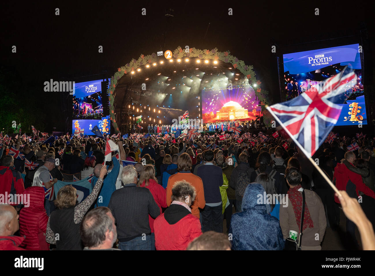 London, UK. 8th Sep, 2018. A celebratory crowd waves Union Jack flags ...