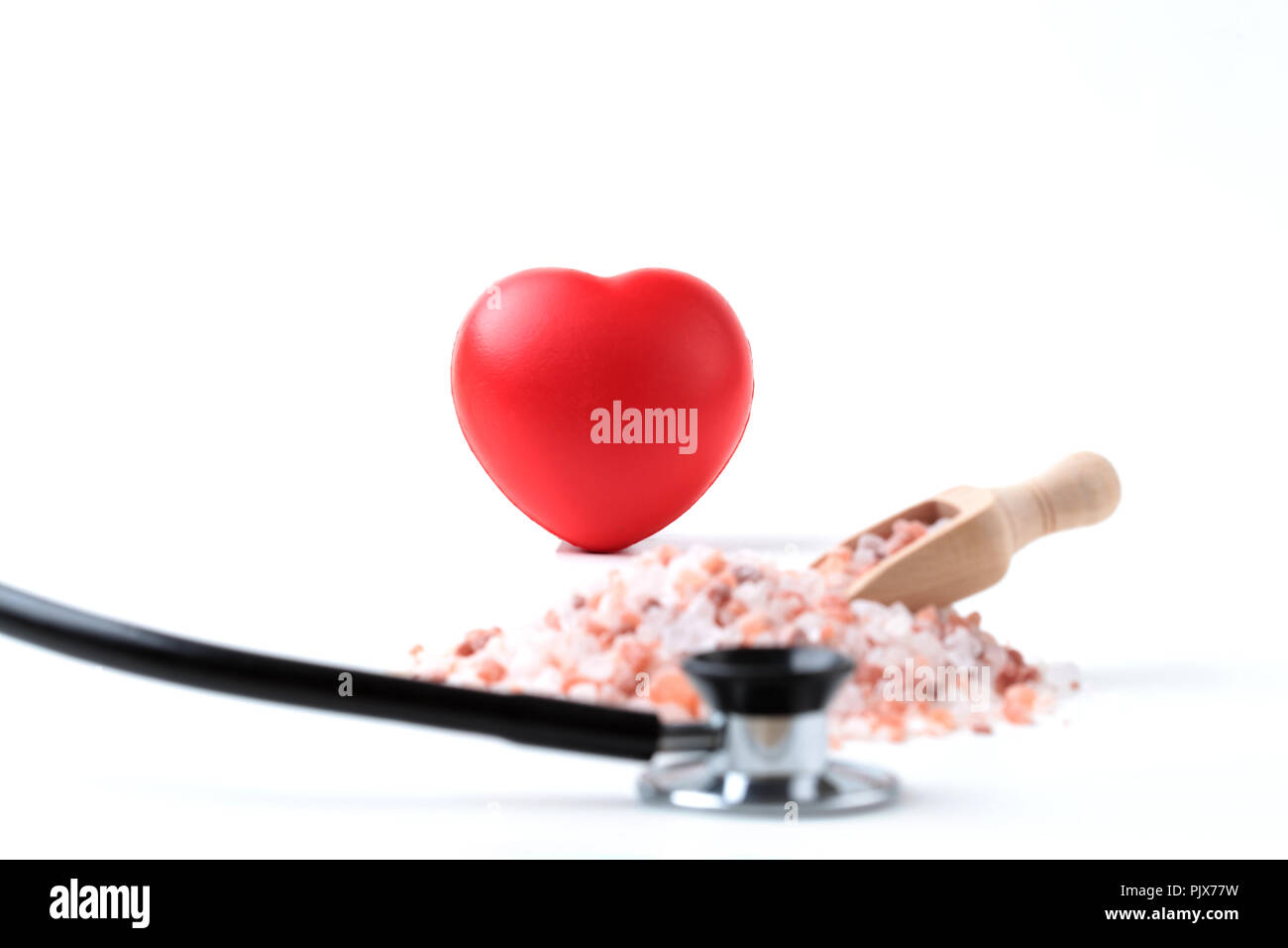 Red Heart Focused With Salt And Black Stethoscope Isolated on White ...