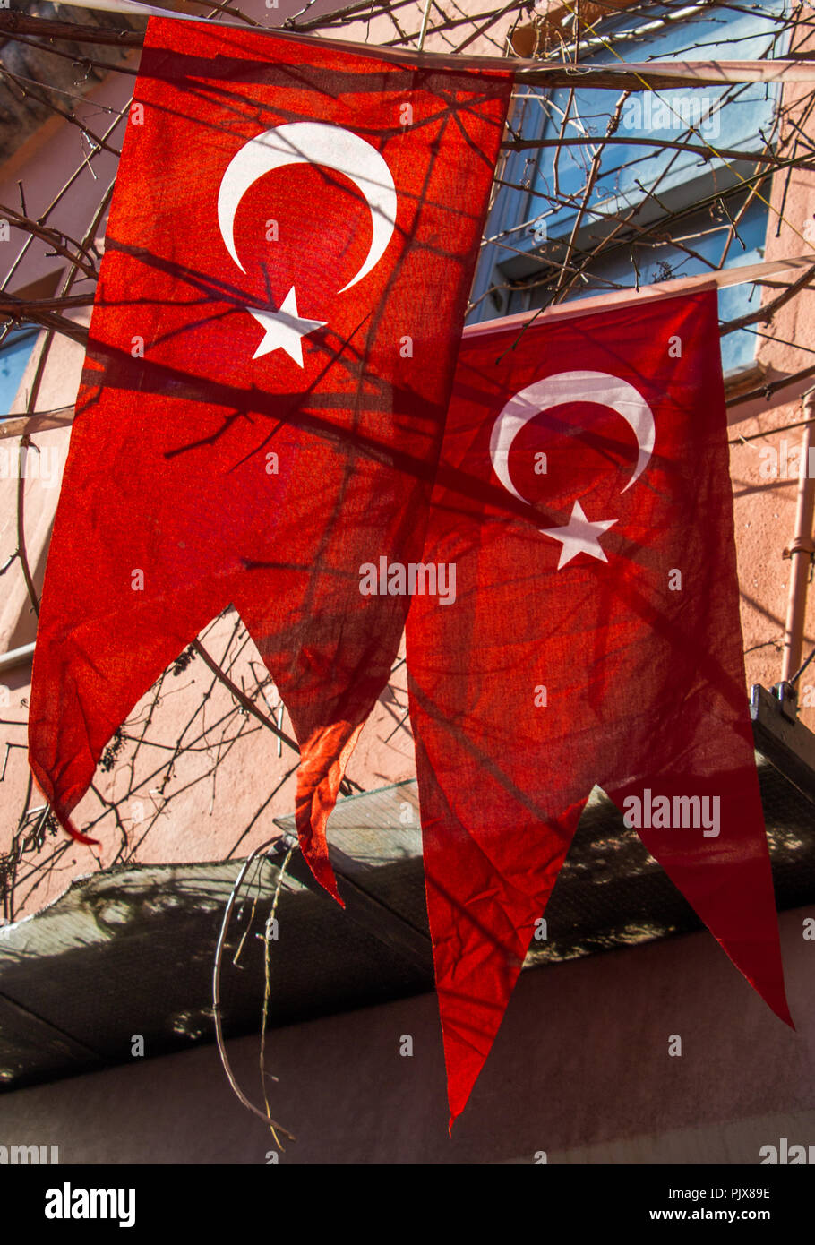 Turkish national flag hanging in the street in open air Stock Photo - Alamy