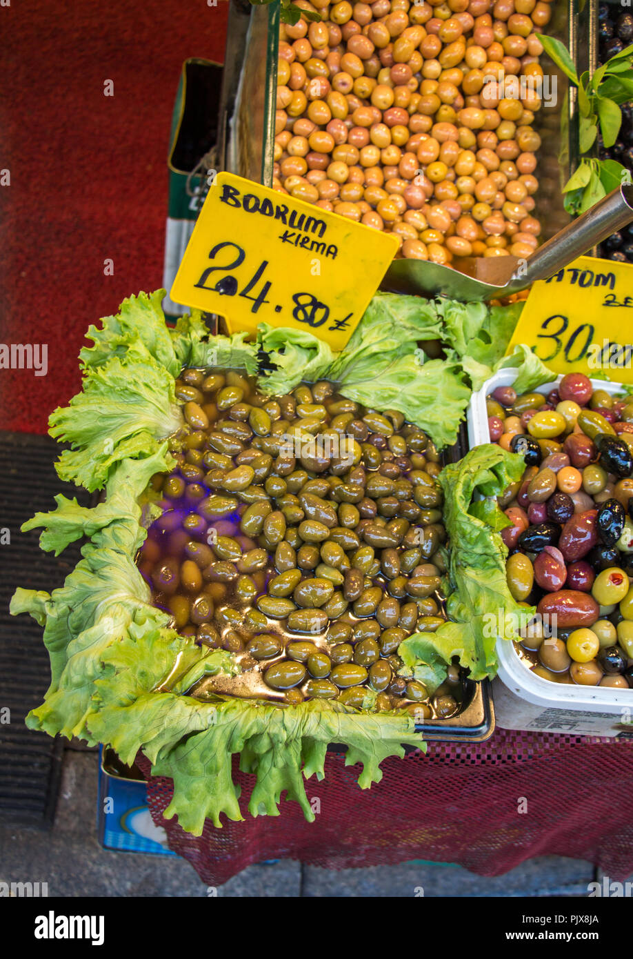 Turkish style prepared olives in the market stands Stock Photo - Alamy