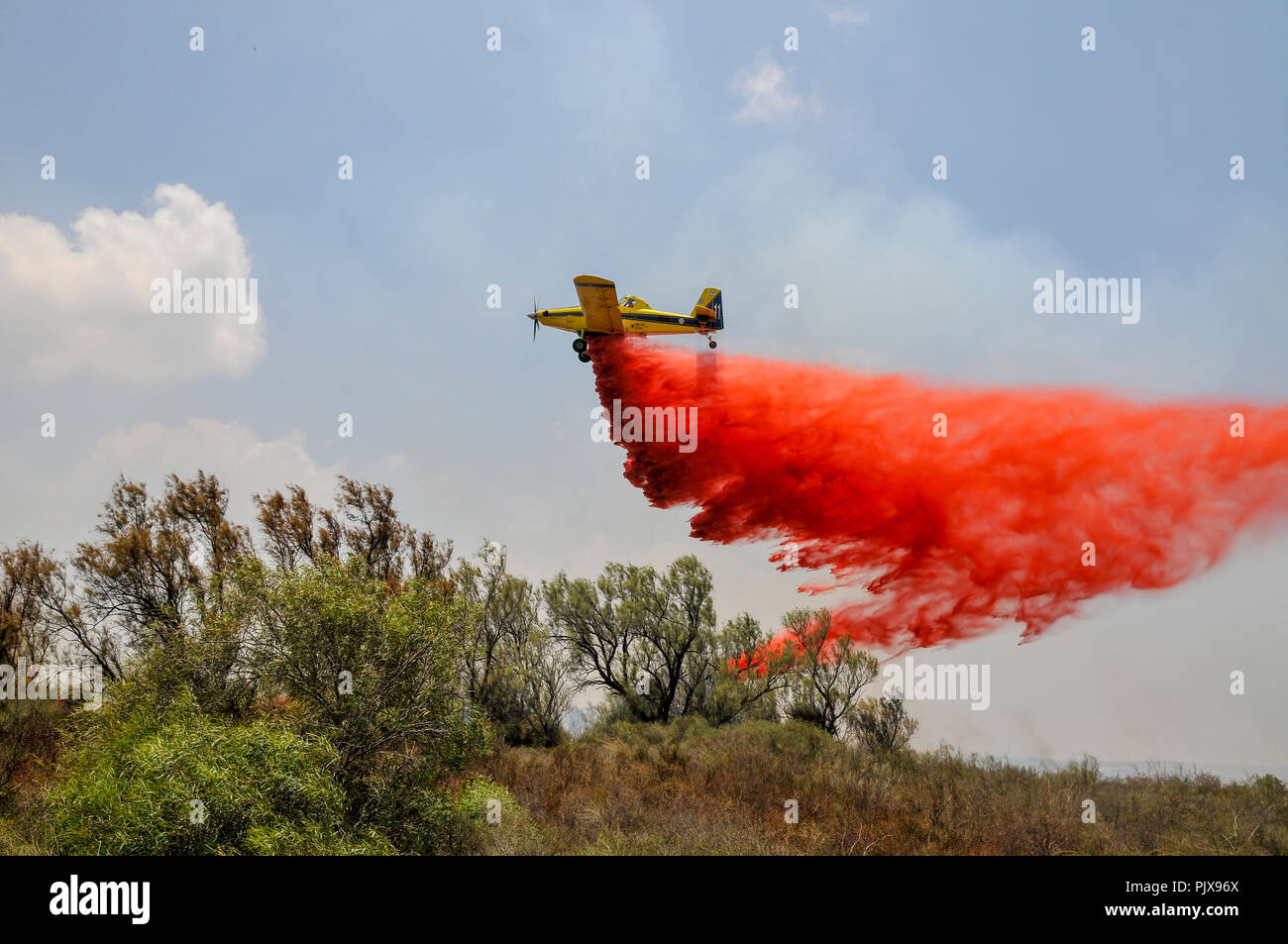 Aircraft drops fire retardant on fire caused by Palestinian Kite bombs ...