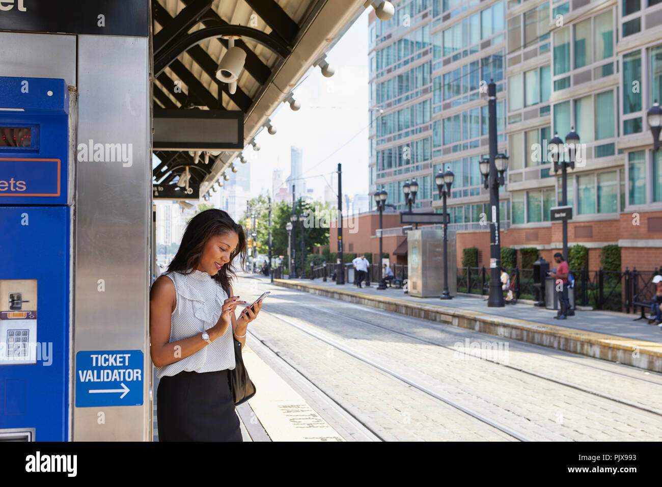 Person using ticket machine station hi-res stock photography and images ...