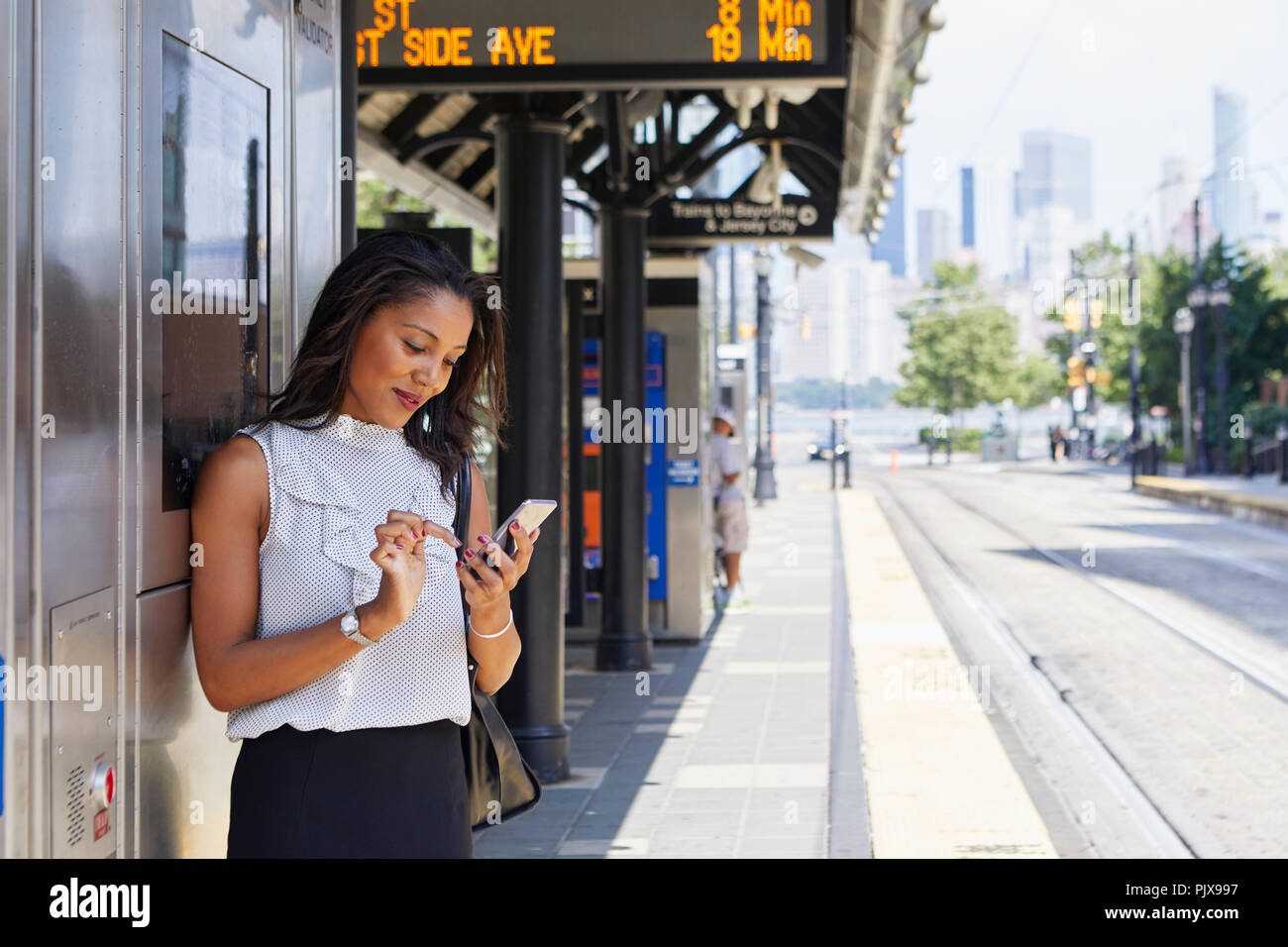 Person using ticket machine station hi-res stock photography and images ...
