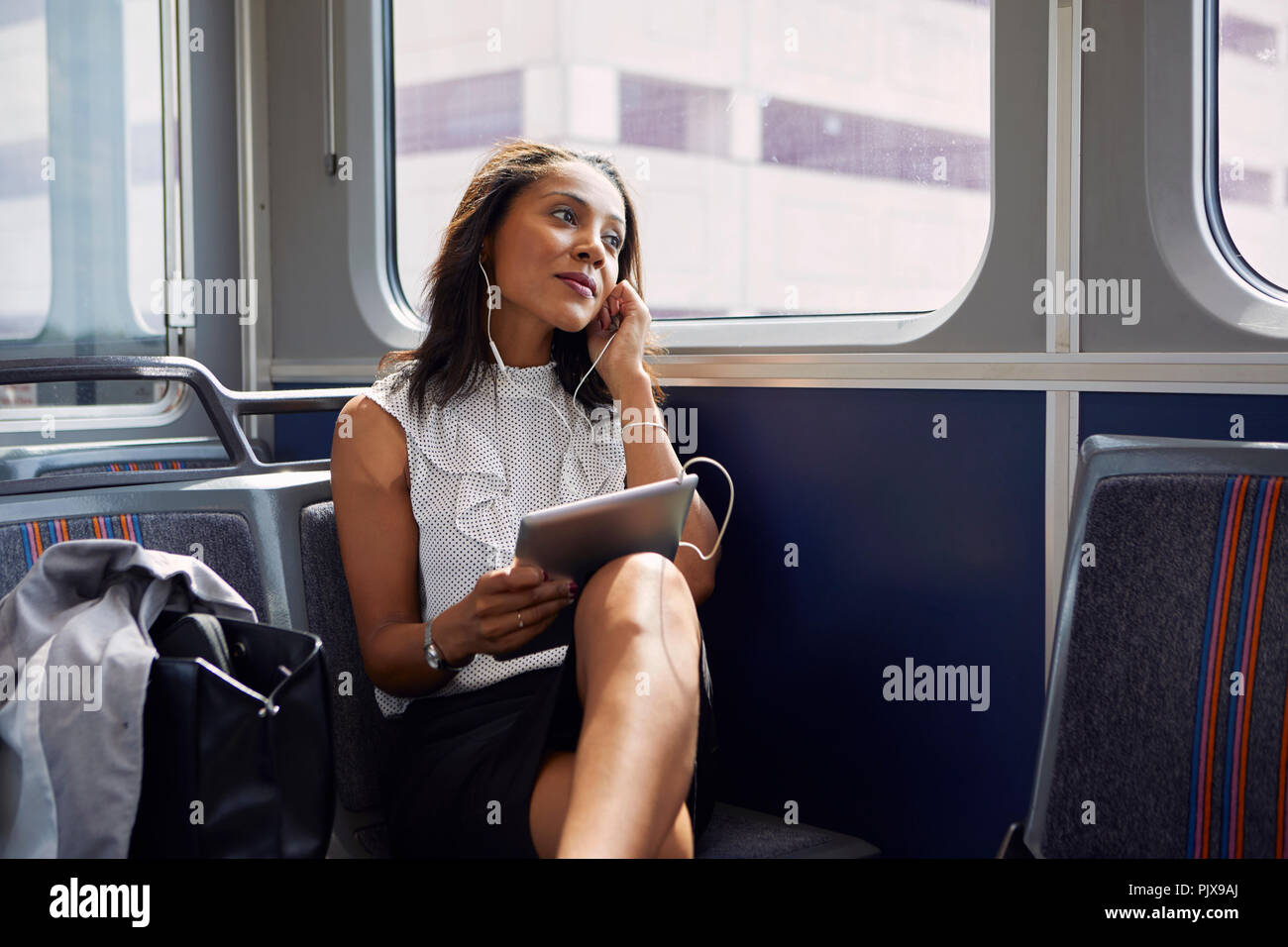 Crossed legs train hi-res stock photography and images - Alamy
