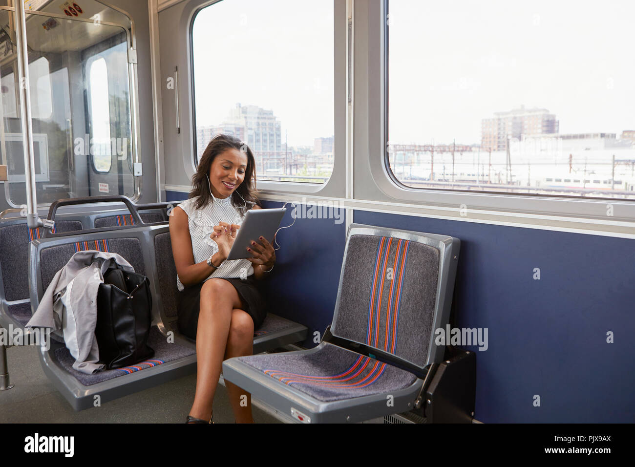 Crossed legs train hi-res stock photography and images - Alamy
