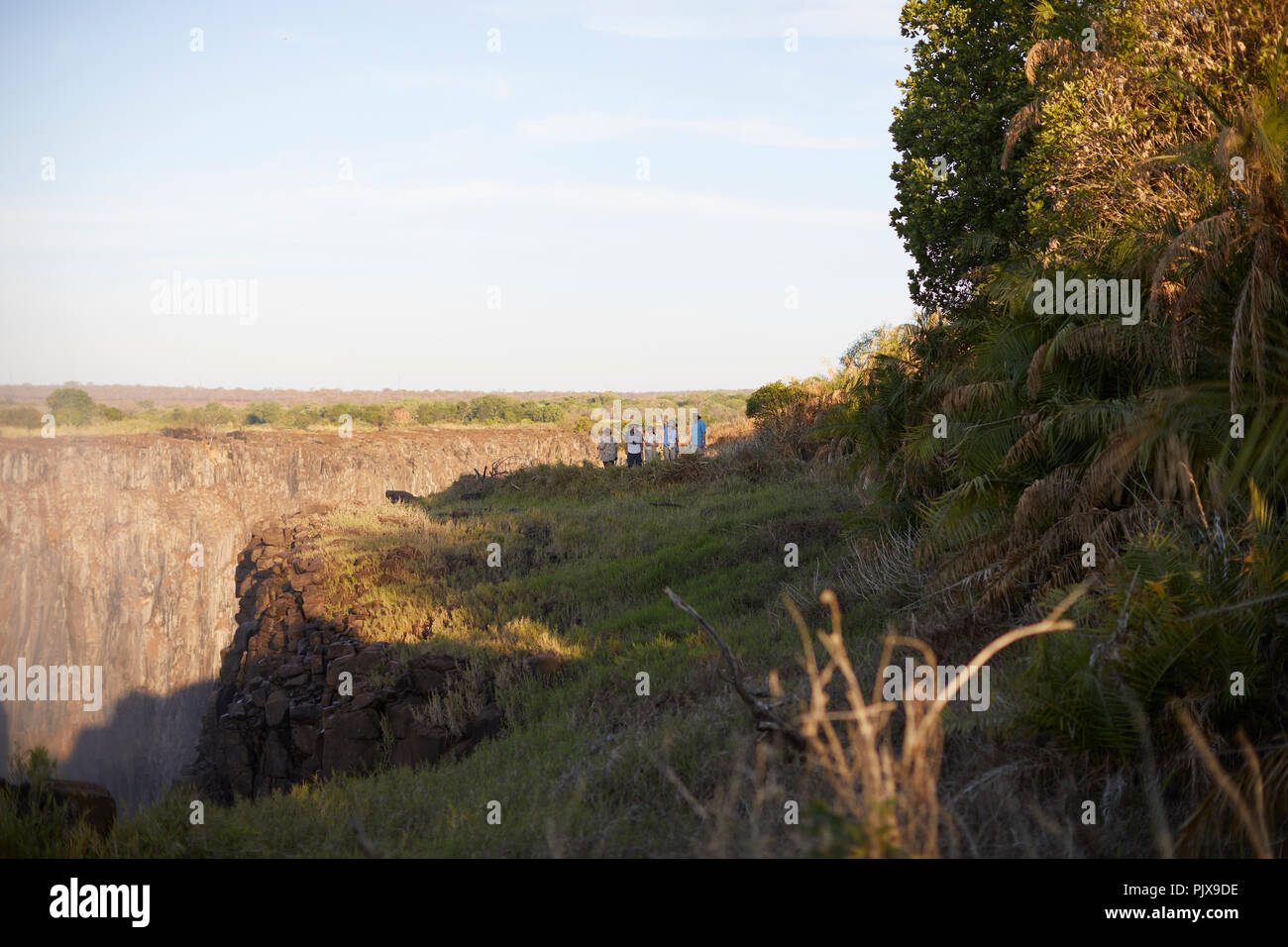Standing on cliff top hi-res stock photography and images - Alamy