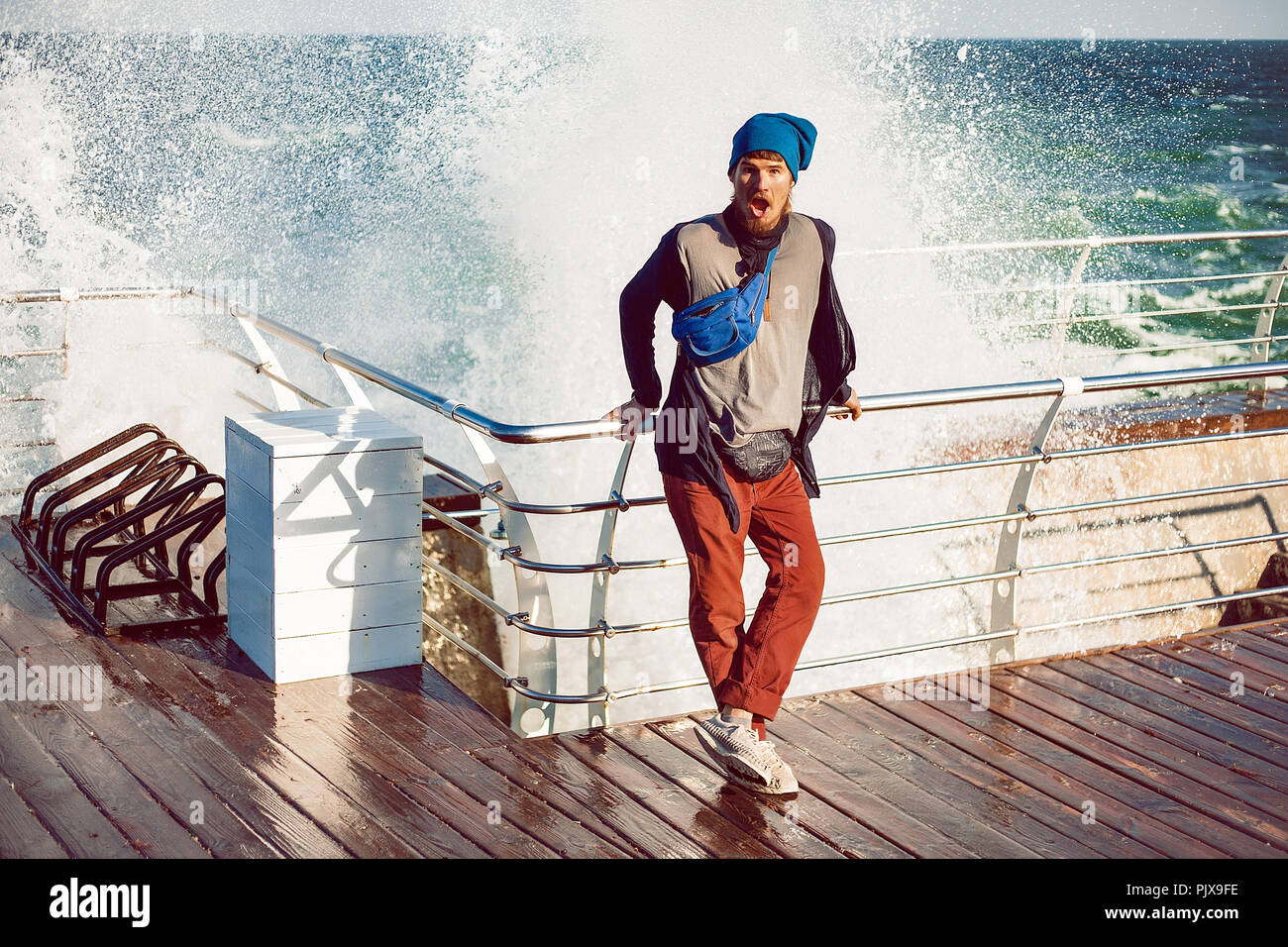 Man leaning against railing hi-res stock photography and images - Alamy