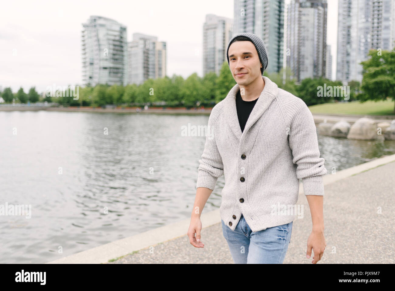 Man walking along wall hi-res stock photography and images - Alamy