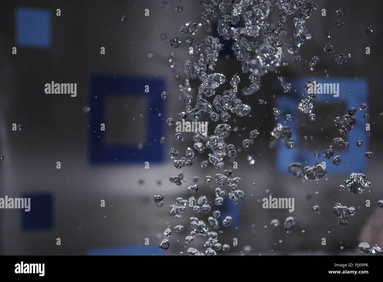 Falling water drops Stock Photo - Alamy