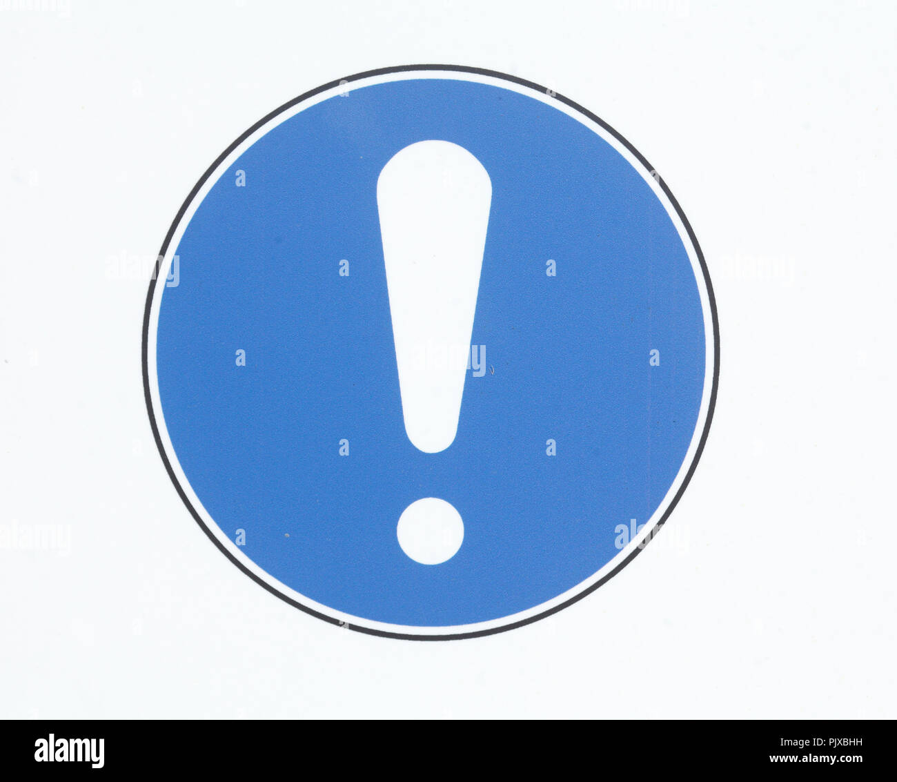 Blue Shield exclamation mark Stock Photo - Alamy