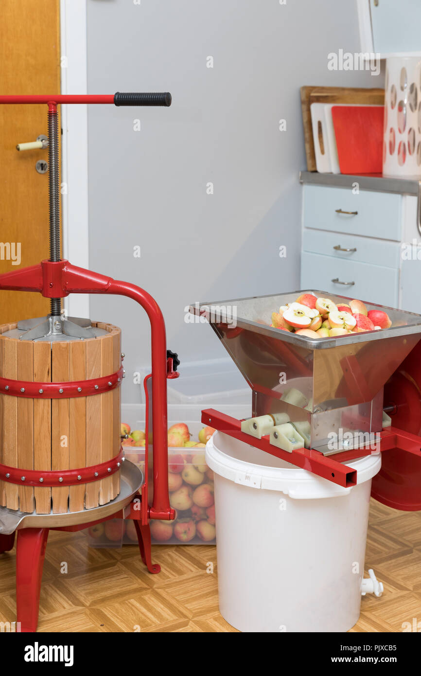 Traditional fruit press Stock Photo - Alamy