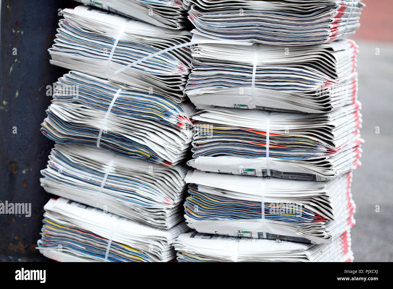 Newspaper pile of daily newspapers, background, texture Stock Photo - Alamy