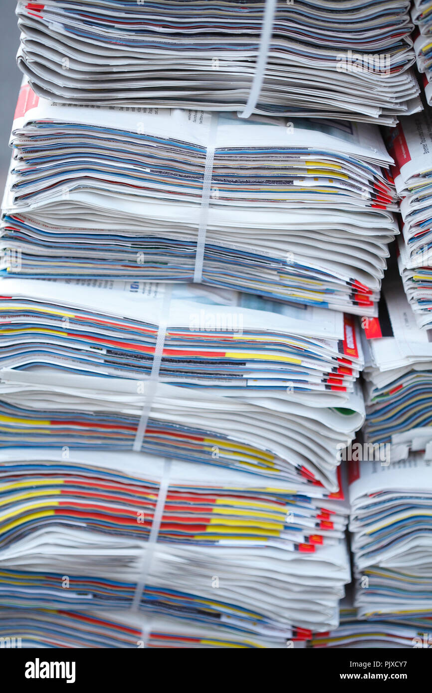 Newspaper pile of daily newspapers, background, texture Stock Photo - Alamy