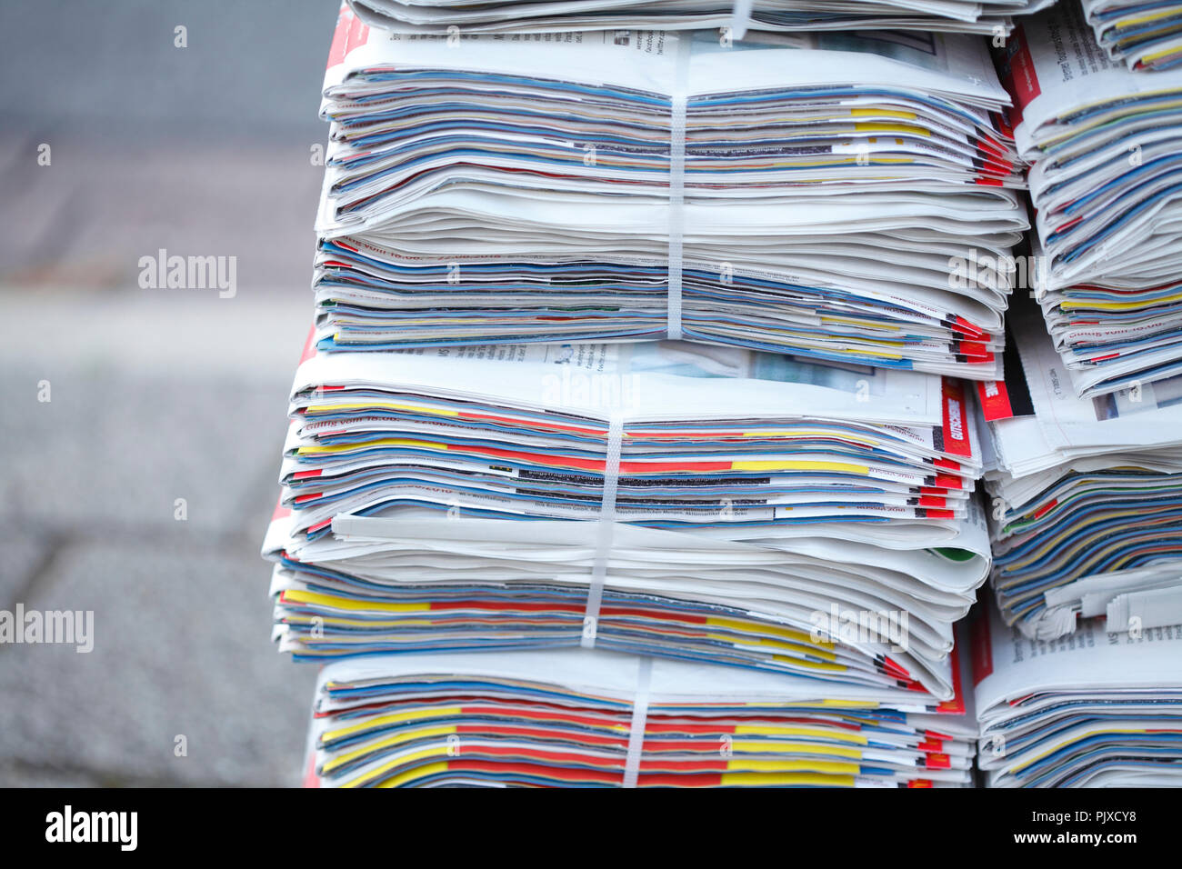Newspaper pile of daily newspapers, background, texture Stock Photo - Alamy