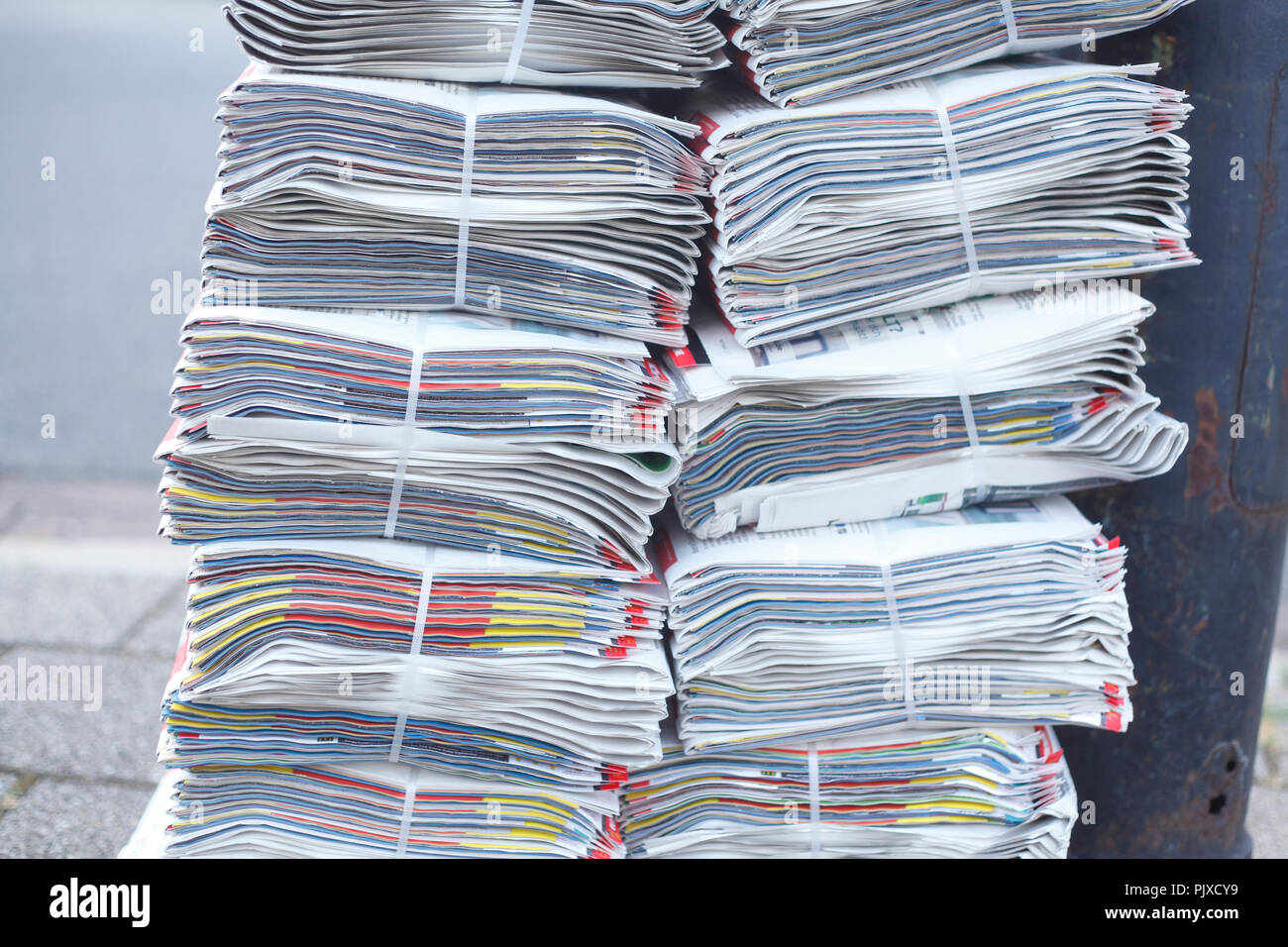 Newspaper pile of daily newspapers, background, texture Stock Photo - Alamy